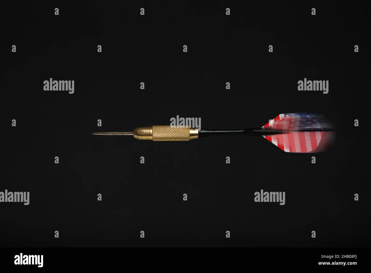 Concept flying dart straight at target for playing darts with color of ...