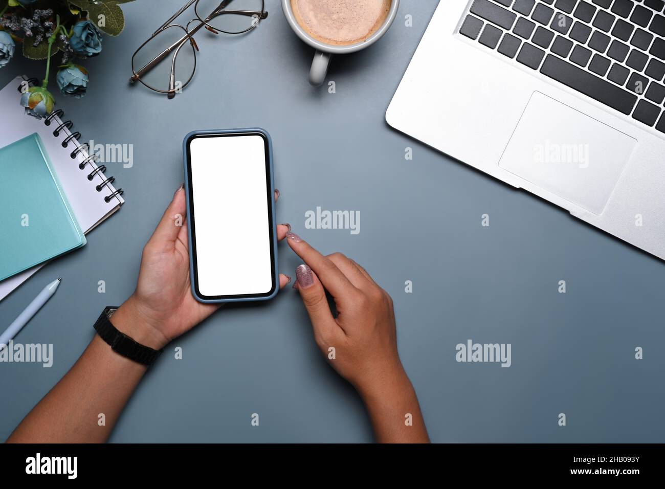 Overhead view female holding smart phone with empty screen Stock Photo ...