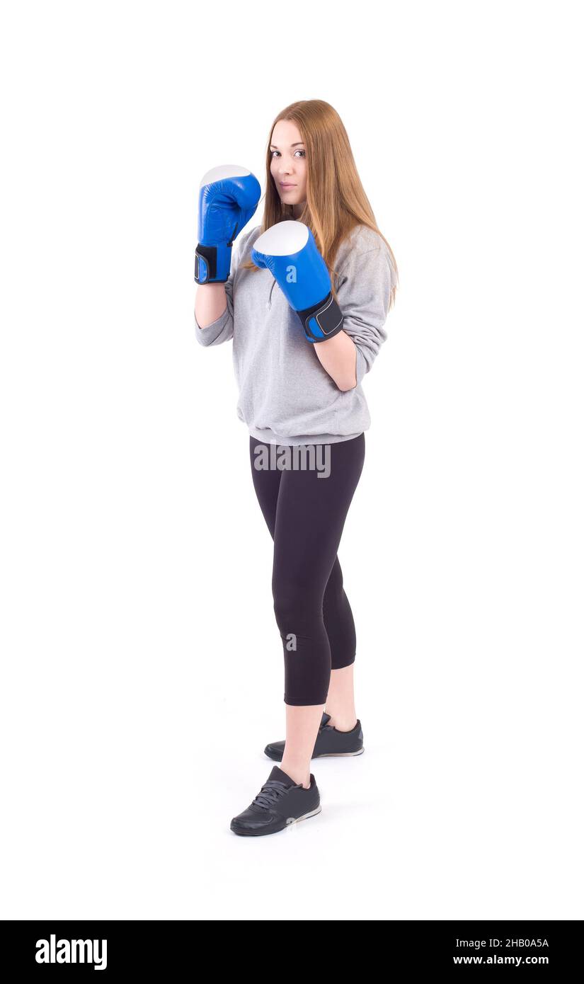Girl exercise kickboxing in studio. Isolated on a white background ...