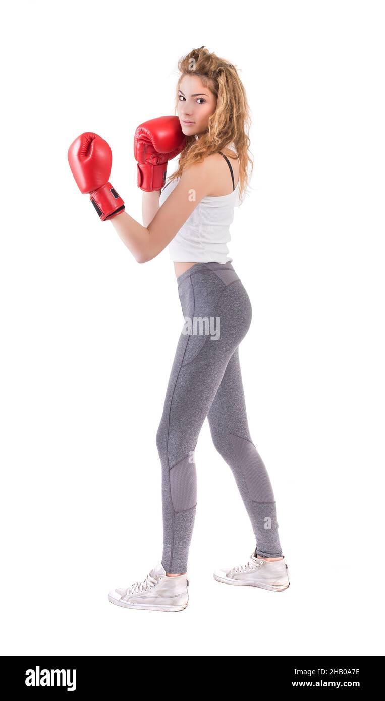 Girl exercise kickboxing in studio. Isolated on a white background ...