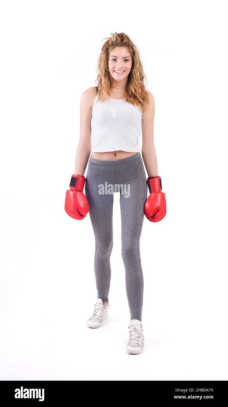Girl exercise kickboxing in studio. Isolated on a white background ...