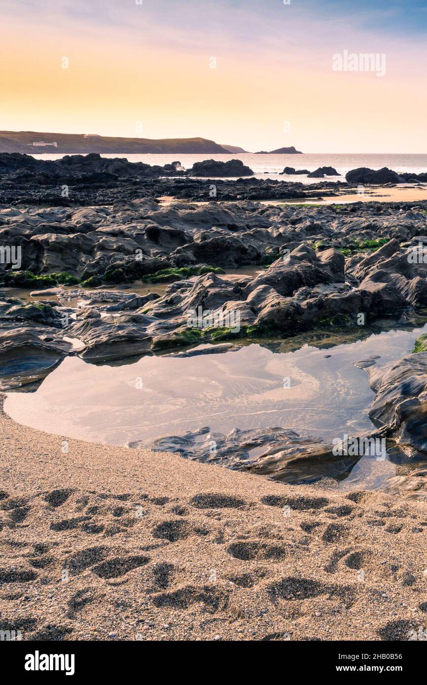 Rocks and rock pools at low tide at the secluded Little Fistral in ...