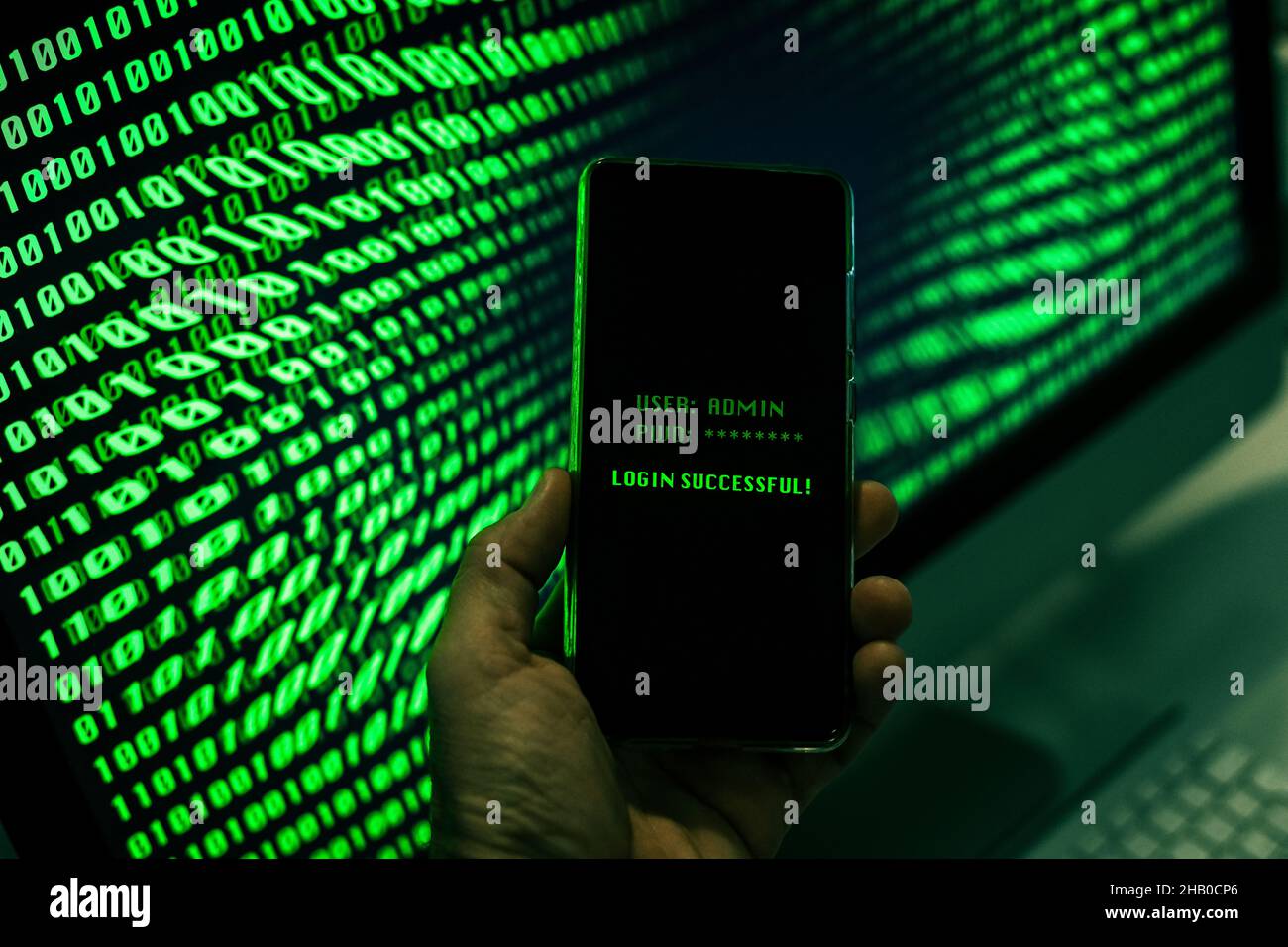 Hand with smartphone doing successful login in a digital network ...