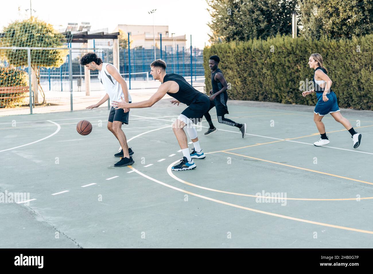 Basketball multicultural together hi-res stock photography and images ...