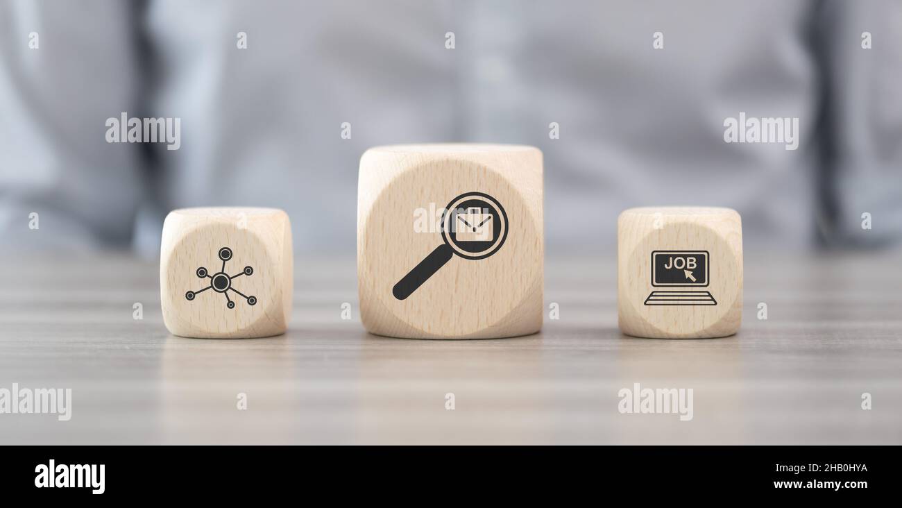 Wooden blocks with symbol of job search concept Stock Photo - Alamy
