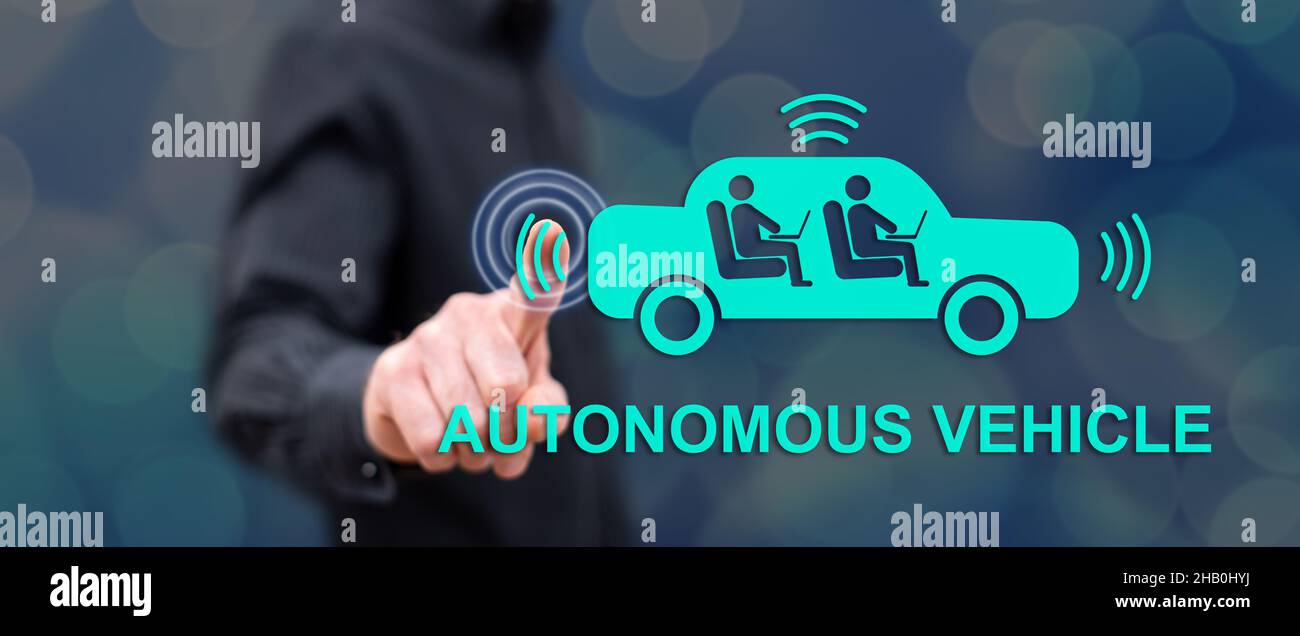 Man touching an autonomous vehicle concept on a touch screen with his ...