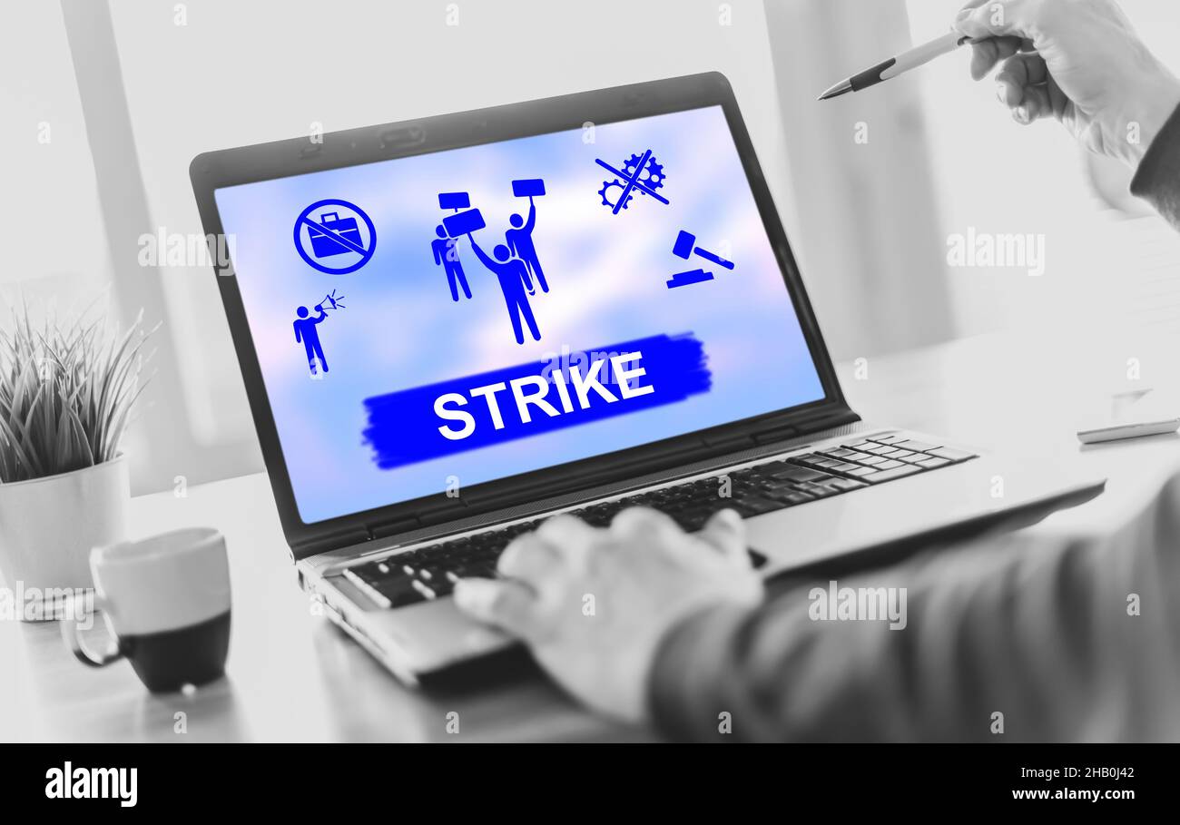 Laptop screen displaying a strike concept Stock Photo - Alamy