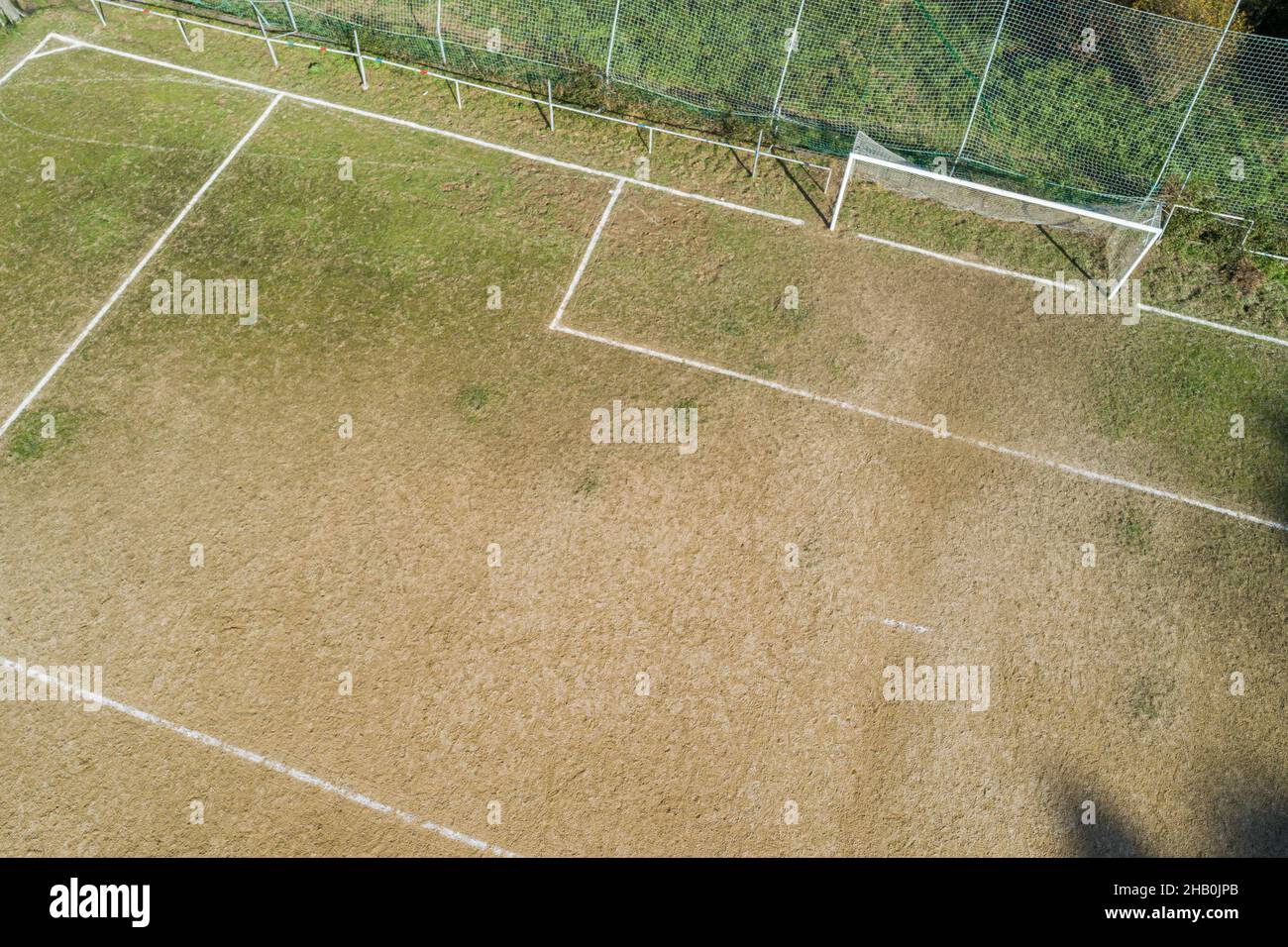 Aerial view of the area and the goal of a dirt football ground Stock ...