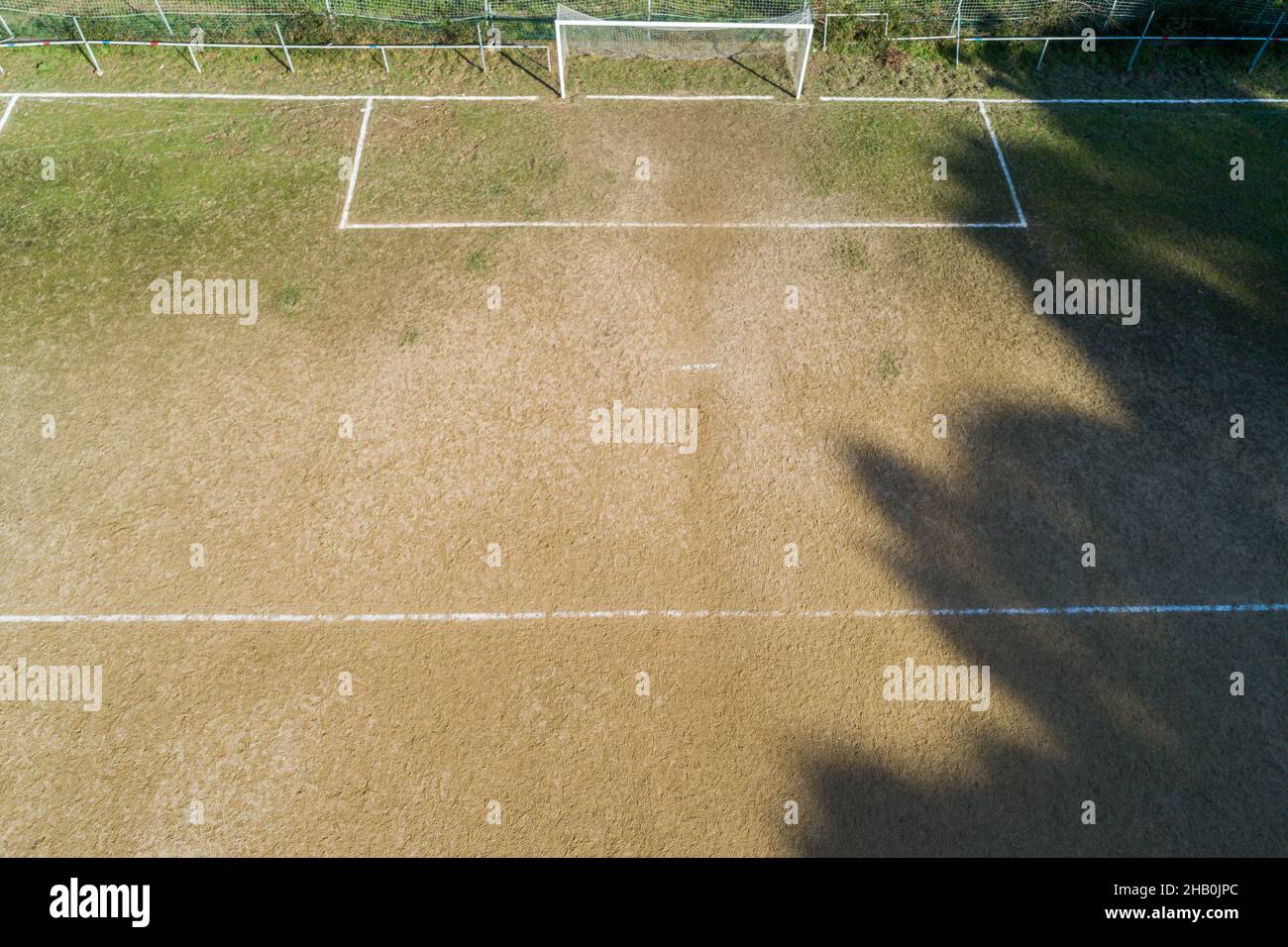 Aerial view of the area and the goal of a dirt football field Stock ...
