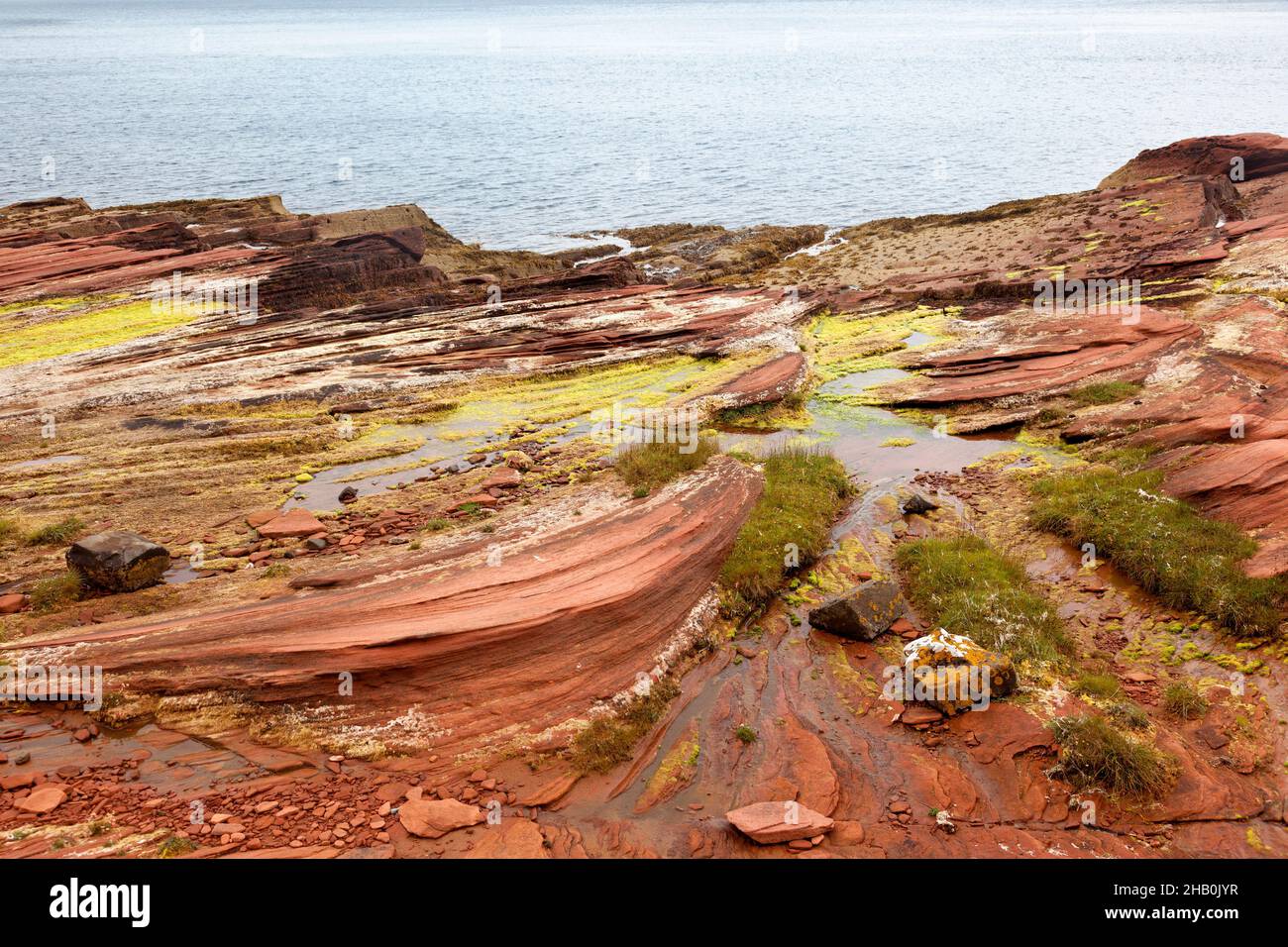 Rock formations on Arran coast, Scotland Stock Photo - Alamy