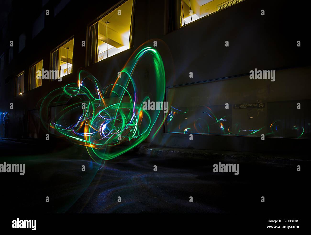Abstract luminous light painting in the dark street Stock Photo - Alamy