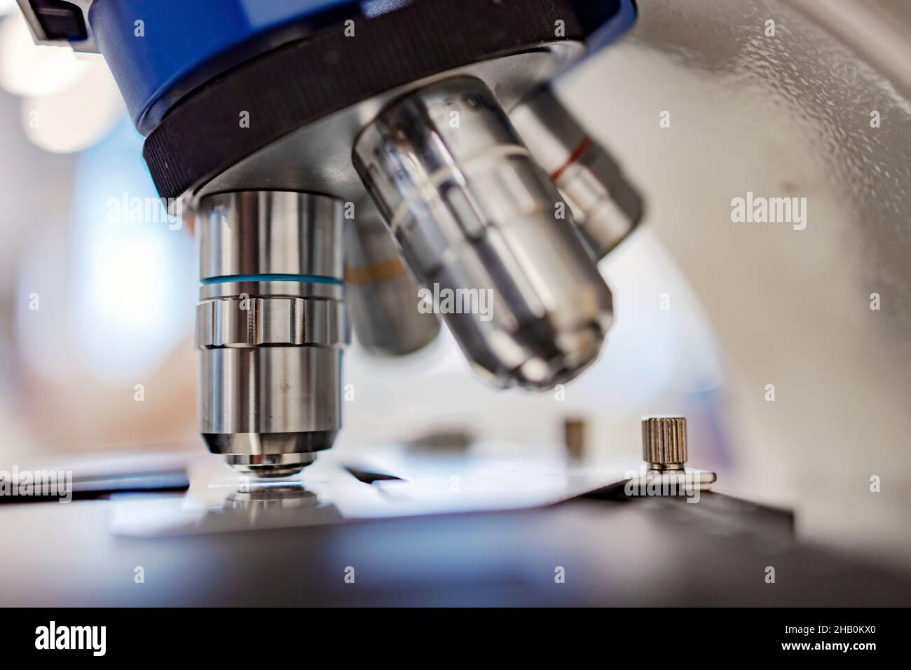 Microbiology and microworld in medicine. Close up of microscope lenses ...