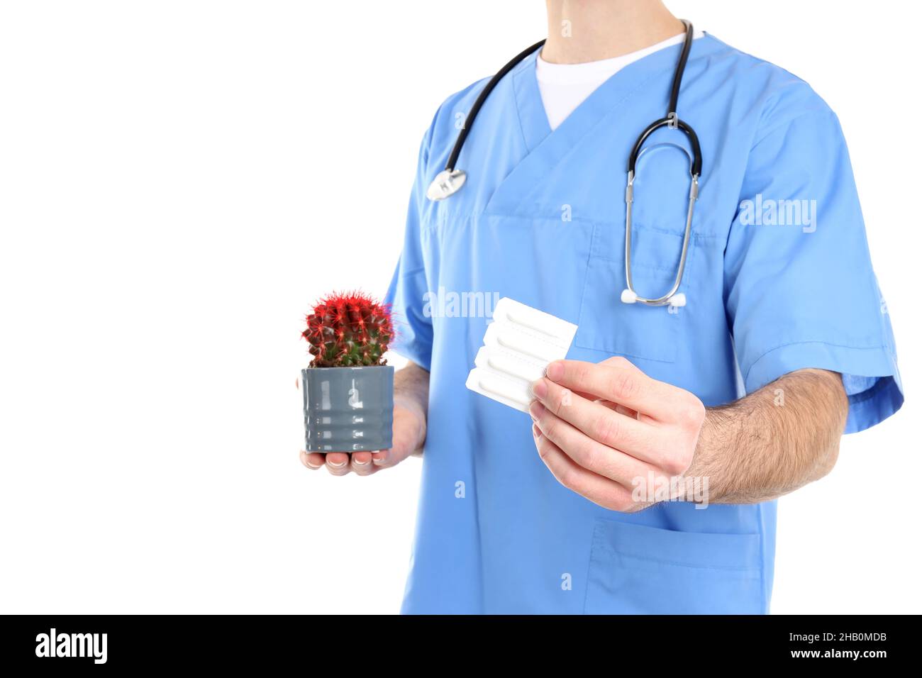 Nurse holds suppositories and cactus, isolated on white background ...