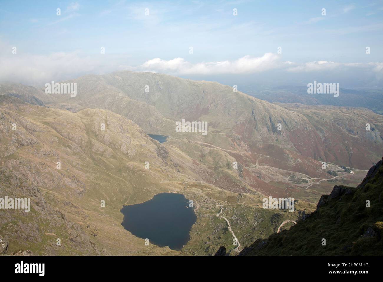 Wetherlam Low Water and Levers Water viewed through mist from the ...