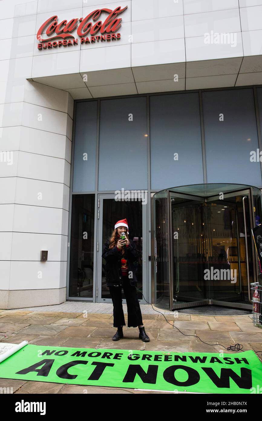 London, UK. 15th December, 2021. A climate activist from Extinction ...
