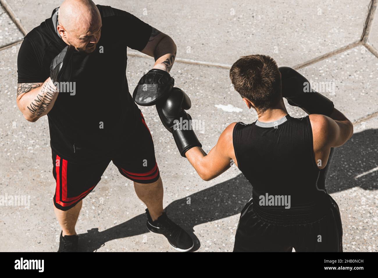 Boxing fitness man woman outside hi-res stock photography and images ...