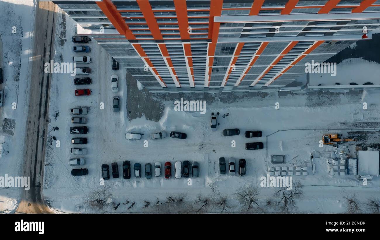 Aerial top view of the typical residential area with many cars parked ...