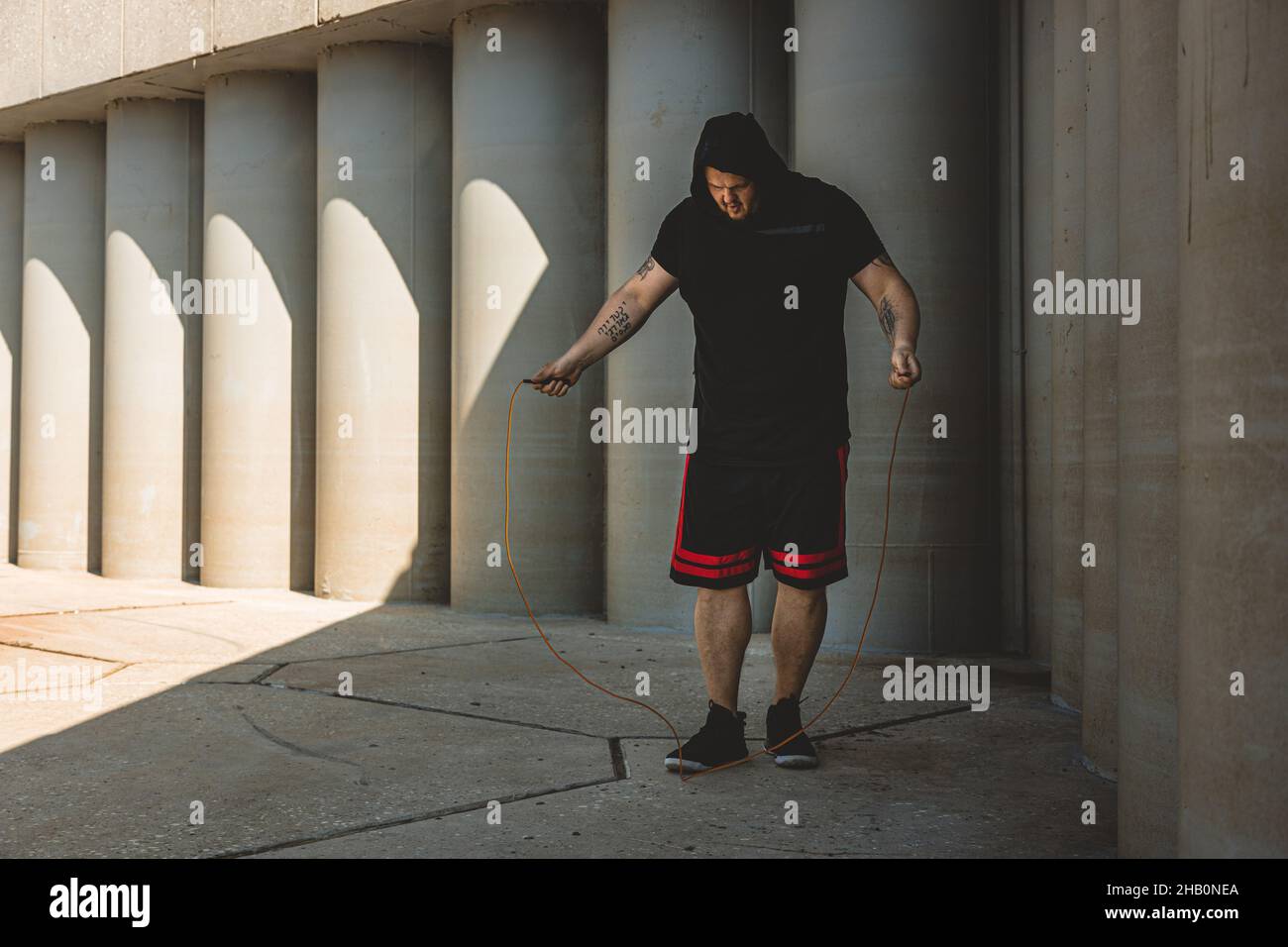 Angry man training punch bag hi-res stock photography and images - Alamy