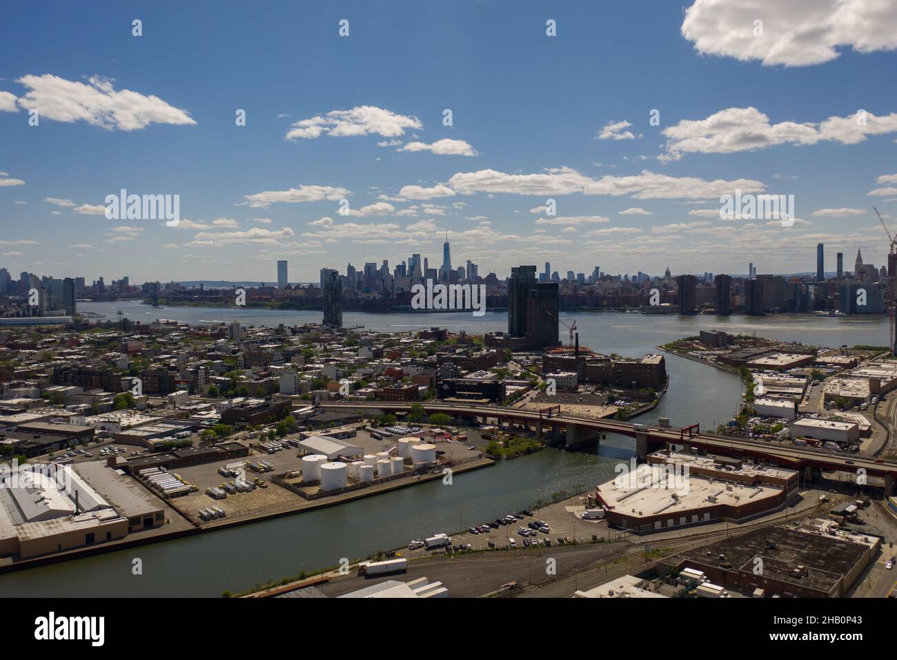 Aerial view of a city with a river, dense buildings and skyscrapers ...