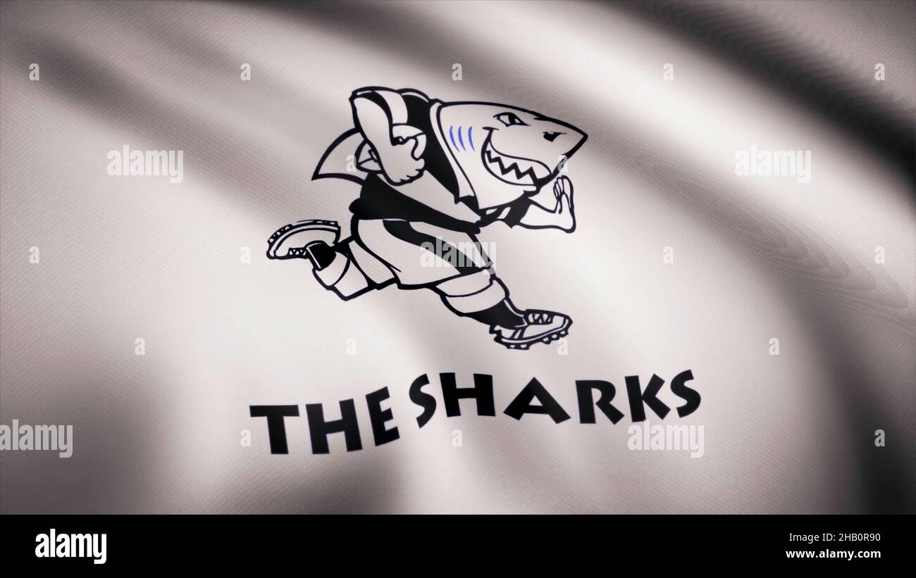 Waving in the wind flag with the symbol of the Rugby team the Sharks ...