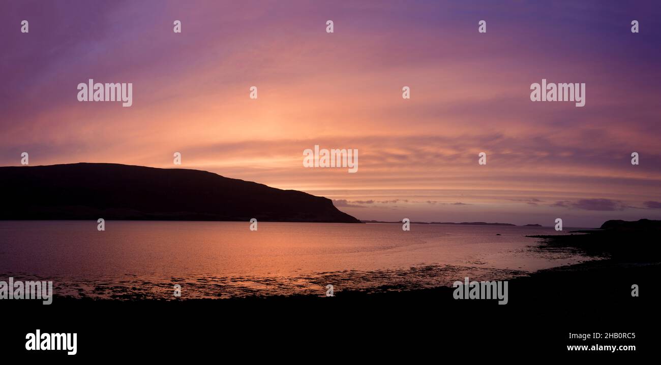 sunset in a beach near to Waternish. Scotland Stock Photo - Alamy