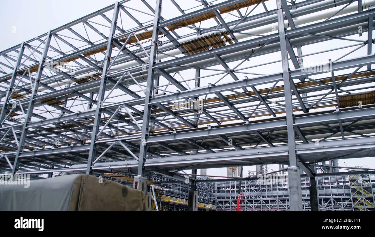 Scaffolding installation at a tank with process structures of refinery ...