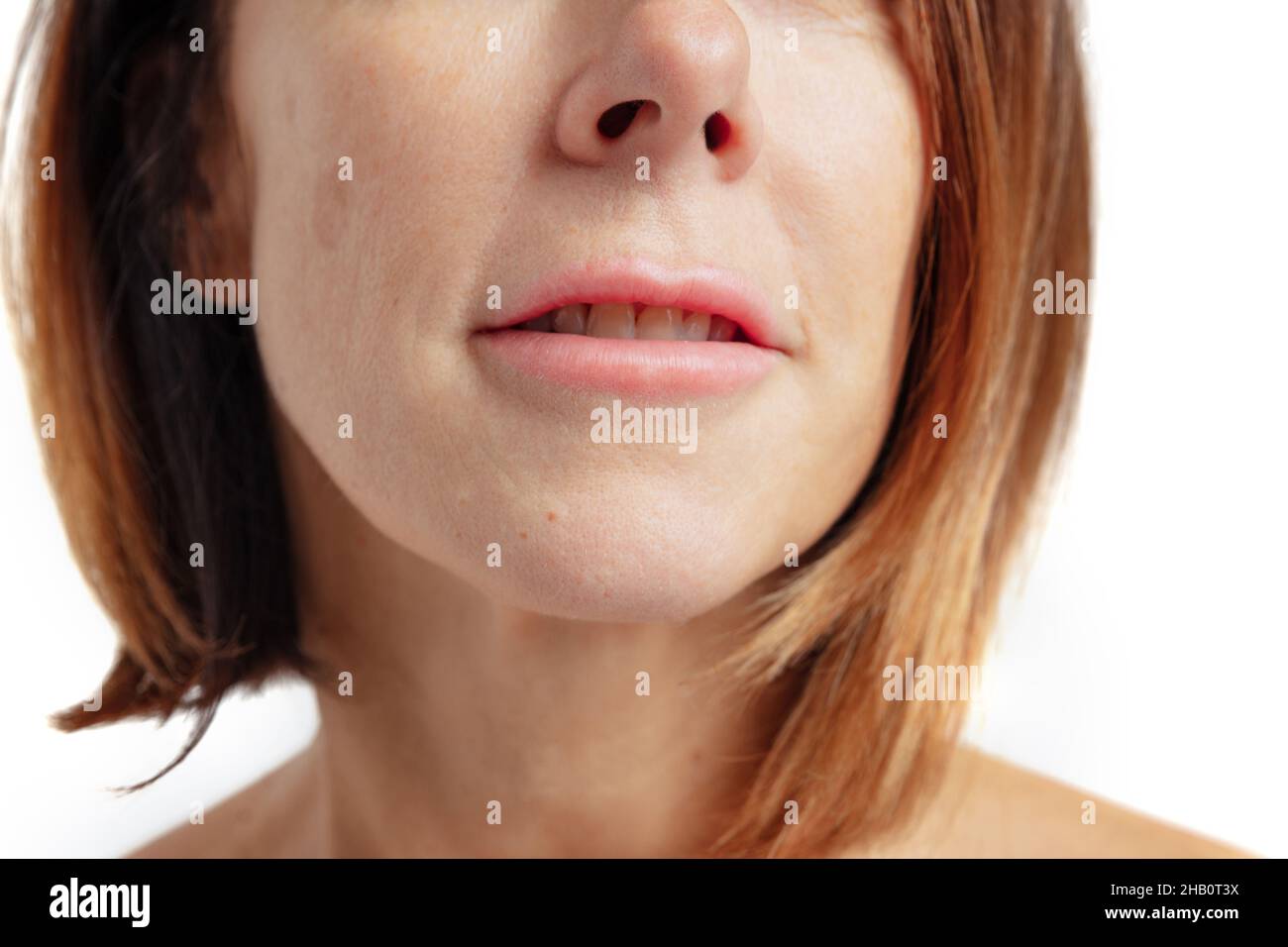 Close-up cropped female face. Mouth, nose and chin. Anti-aged ...
