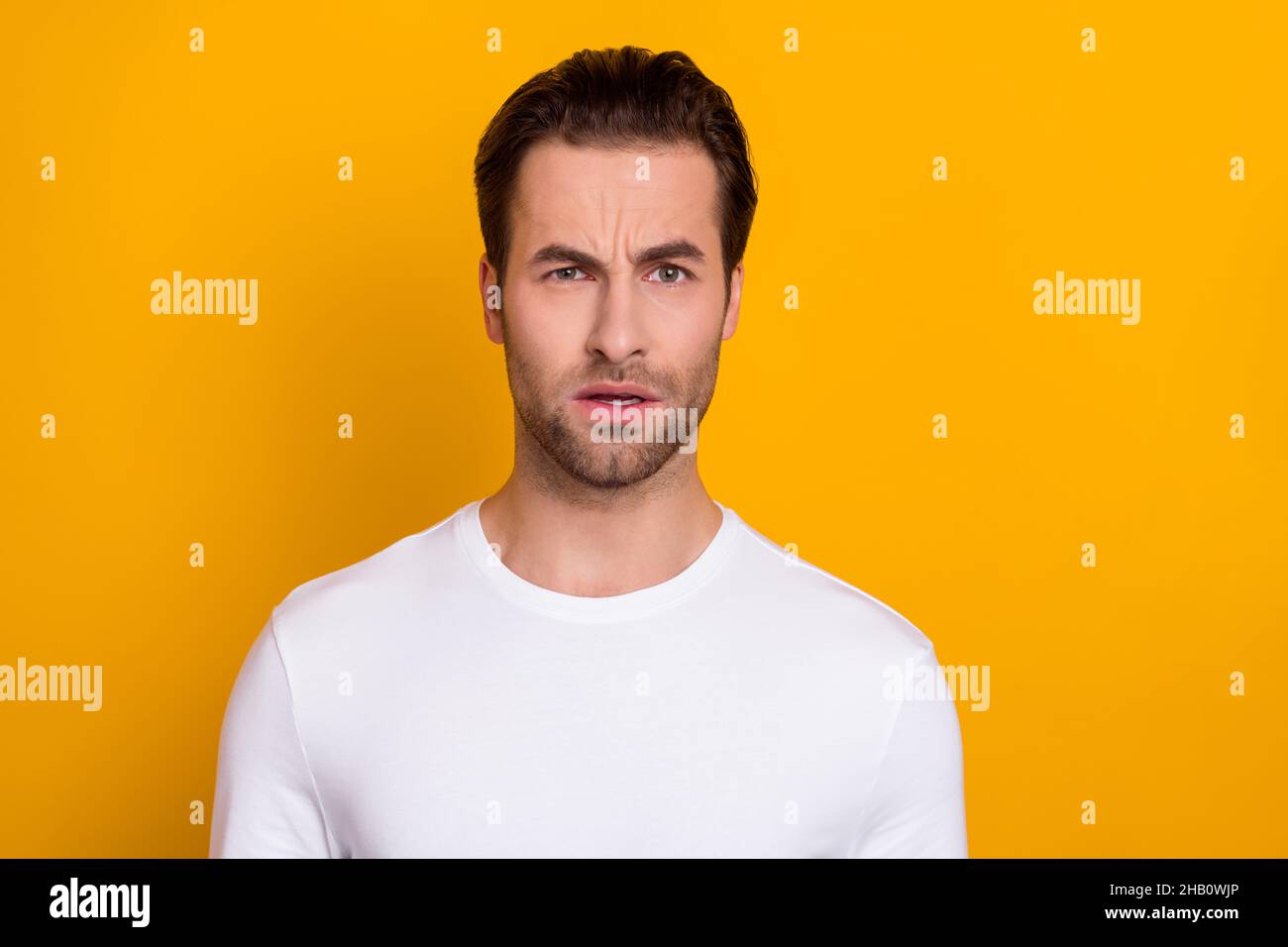 Photo of young man dilemma stupor impressed failure thoughtful isolated ...