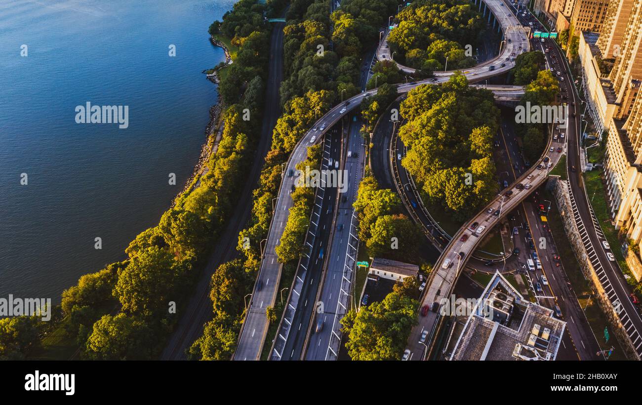 Aerial view of a city with a river, highways and dense buildings Stock ...