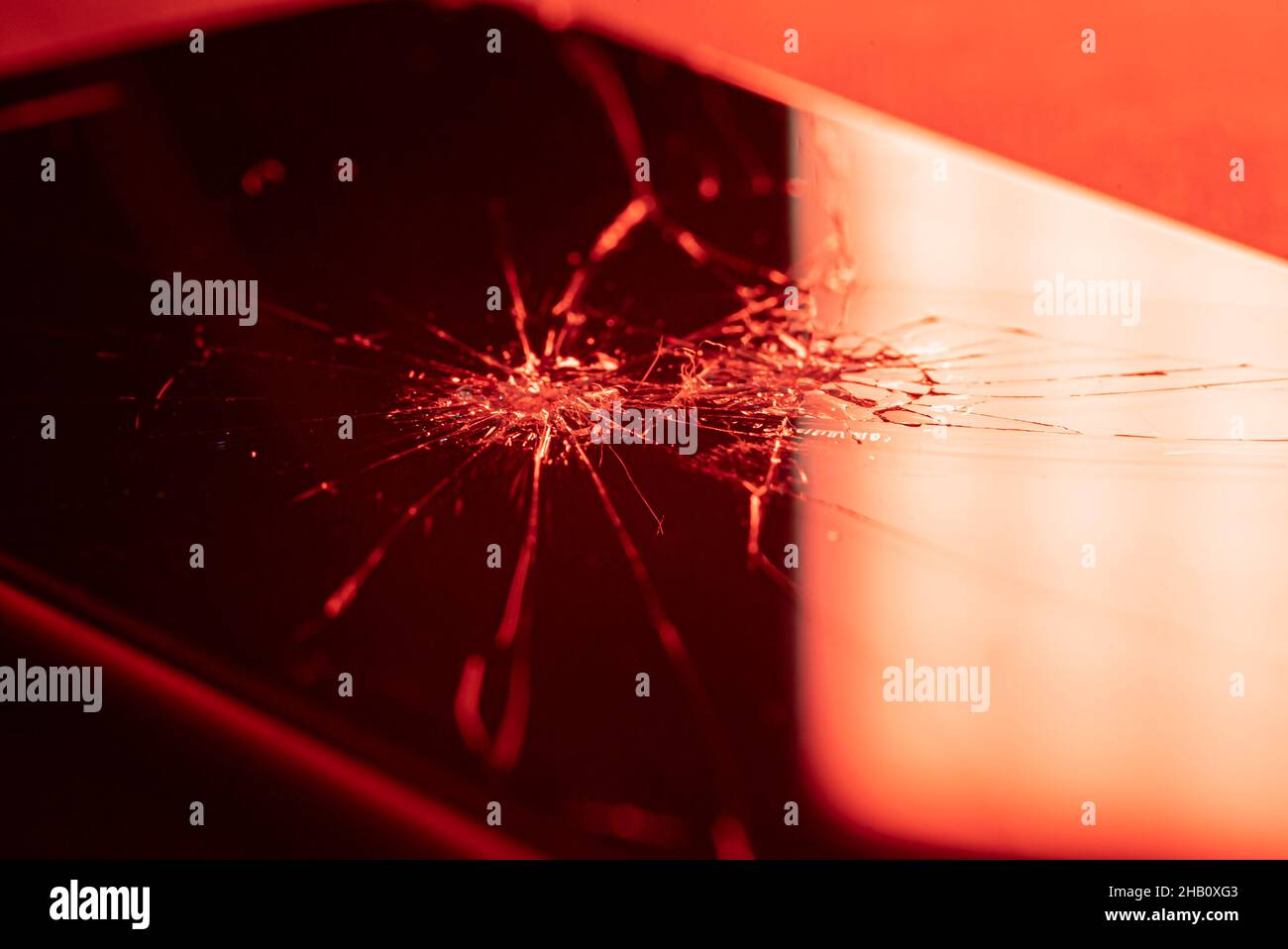 Detail of a broken and cracked smartphone screen. Smart phone with ...