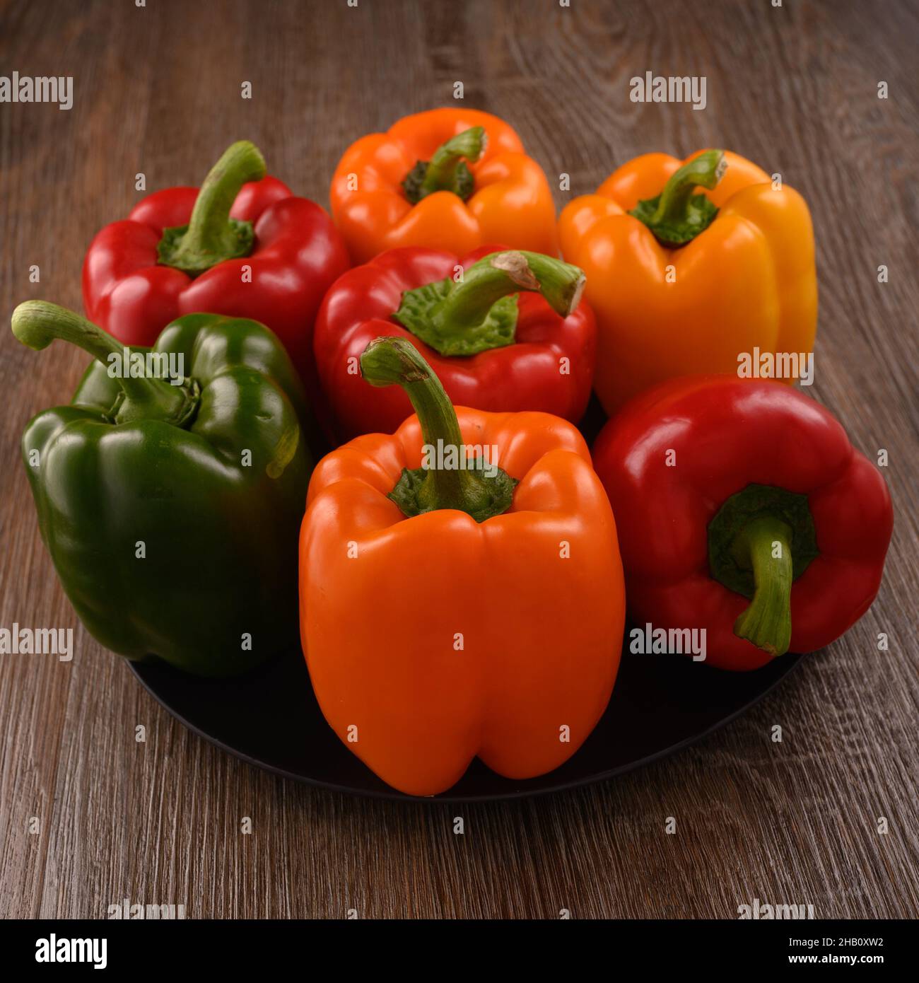 Photo shows peppers in three colors: yellow, red and green. Photo was ...
