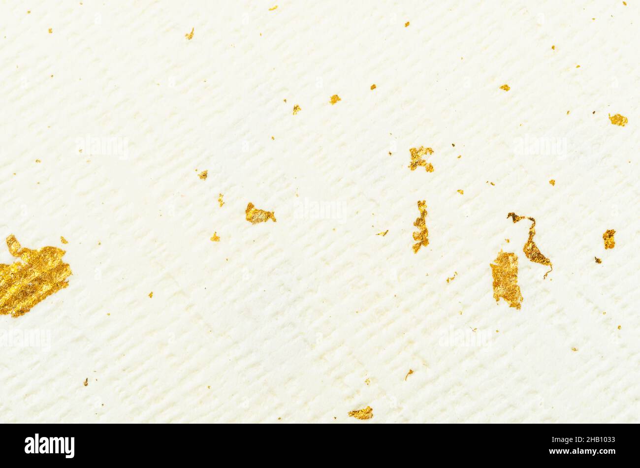 Paper with gold sheet texture as background Stock Photo - Alamy