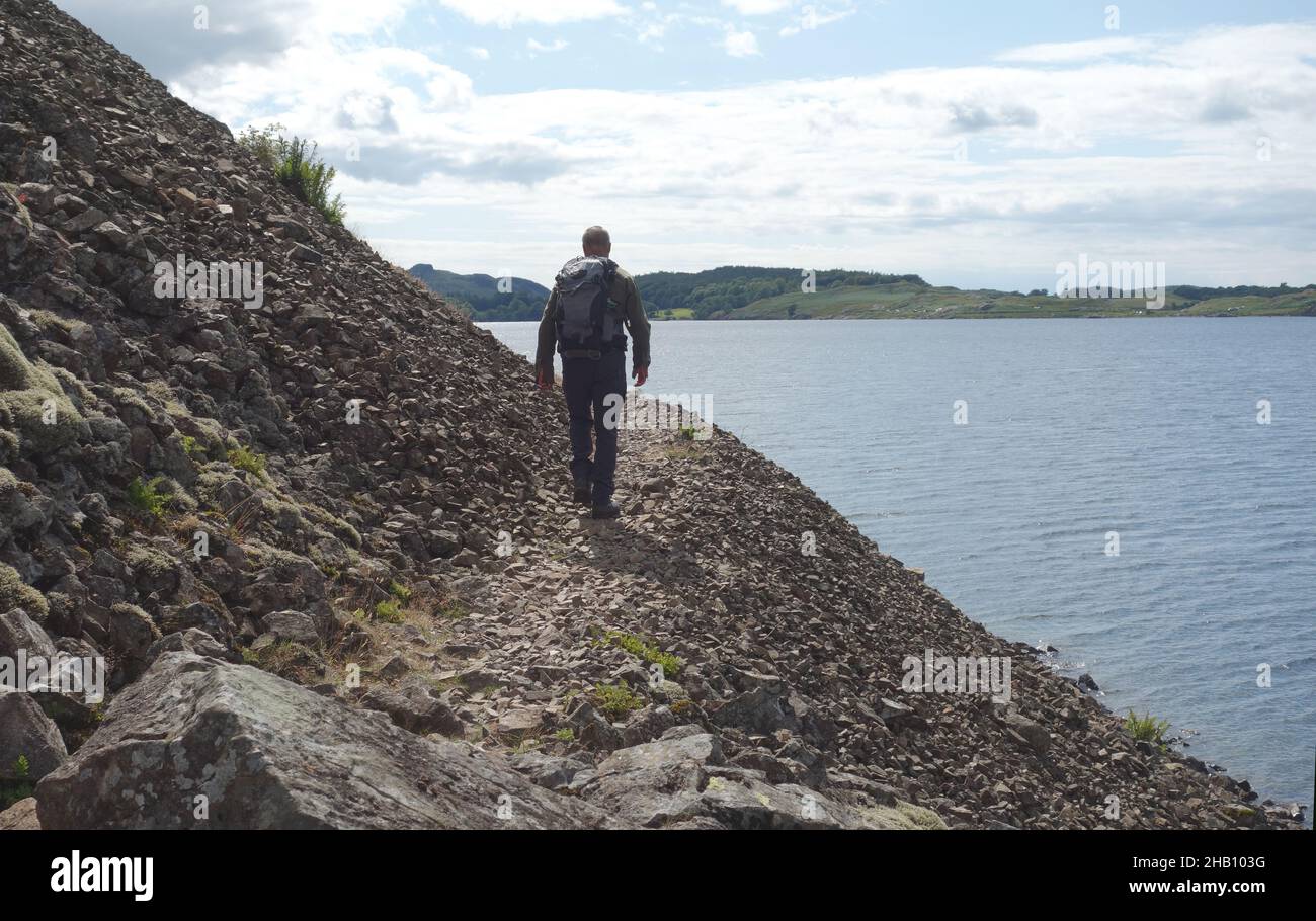 Man Walking on Scree Path by Wast Water Lake to the Wainwright 'Whin ...