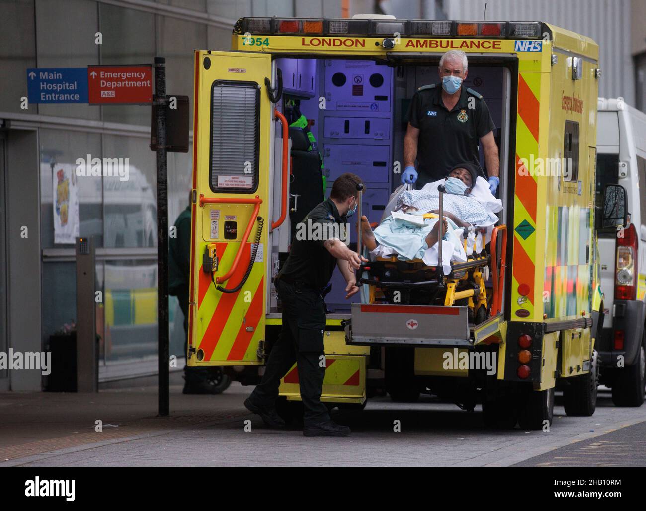 London, UK. 16th Dec, 2021. A steady stream of patients arriving at The ...
