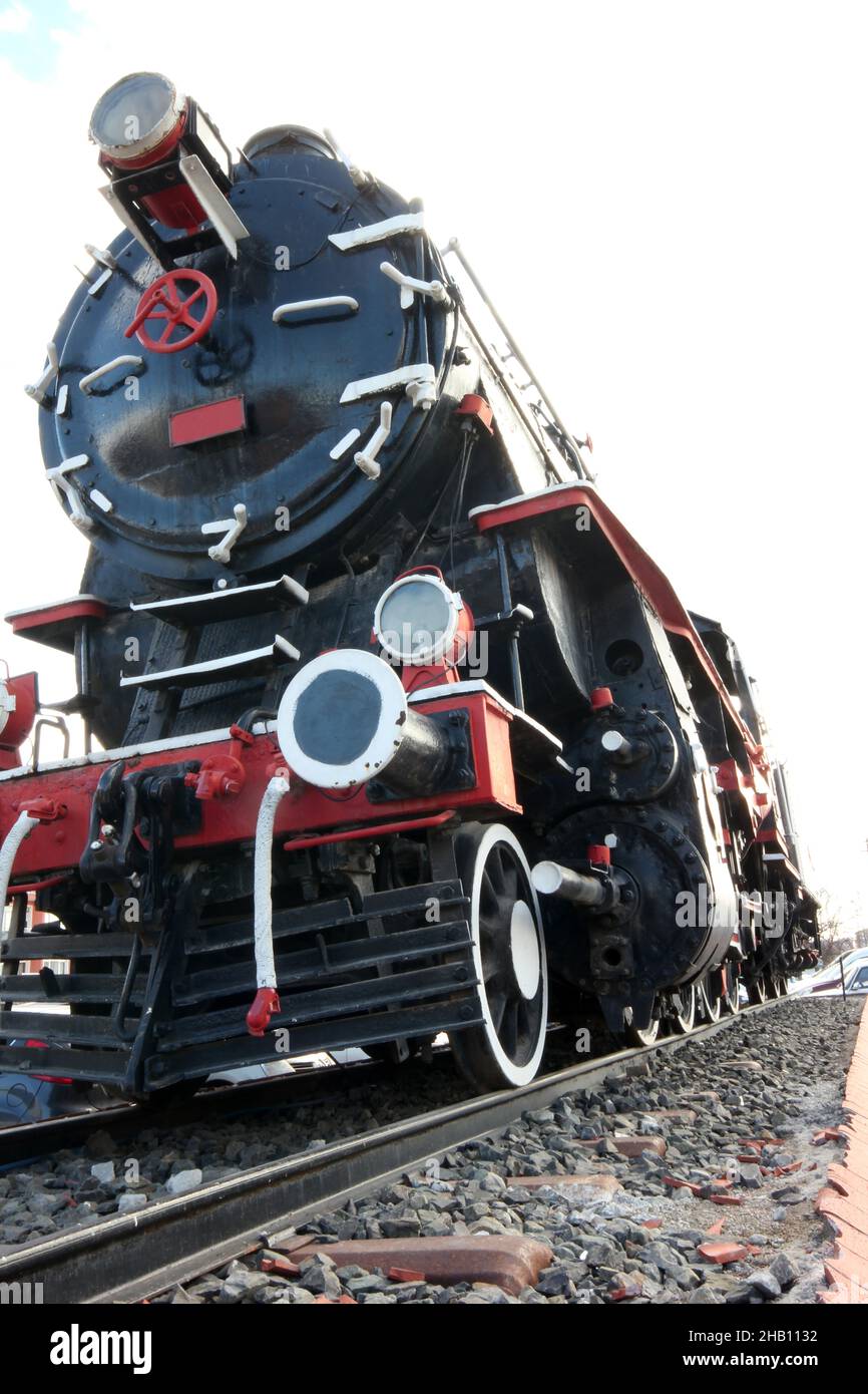 old steam train locomotive at the station Stock Photo - Alamy