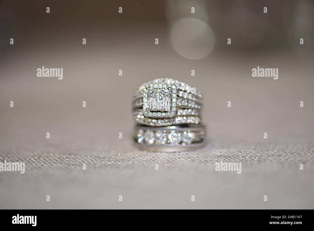 Stacked wedding rings hi-res stock photography and images - Alamy
