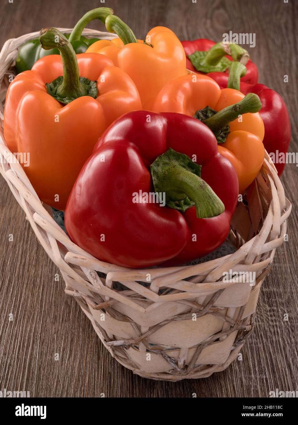 Photo shows peppers in three colors: yellow, red and green. Photo was ...