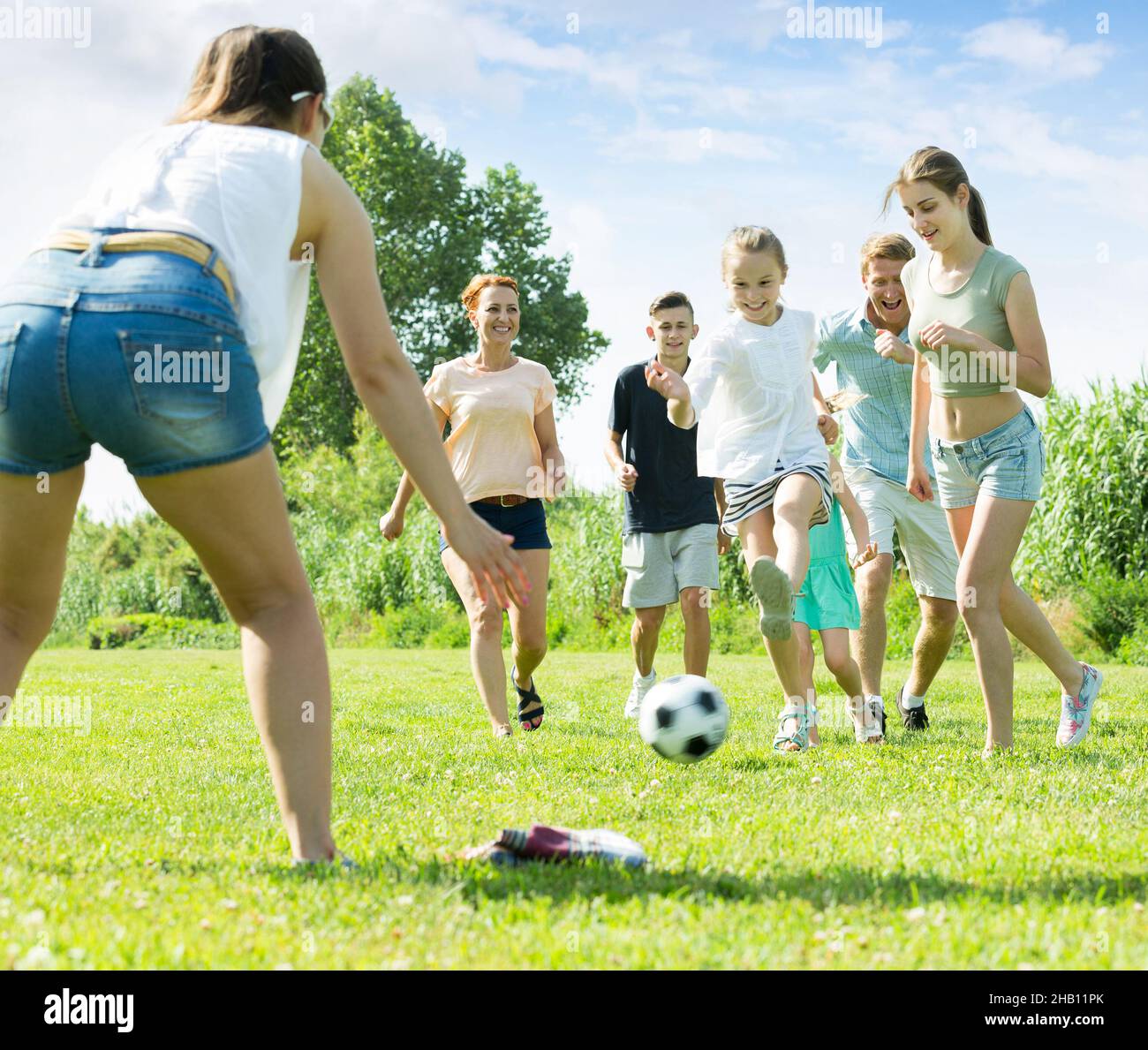 Boy running after soccer ball hi-res stock photography and images - Alamy