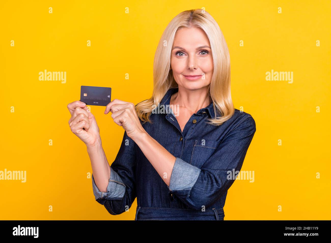 Photo of shiny adorable lady pensioner dressed denim outfit showing ...