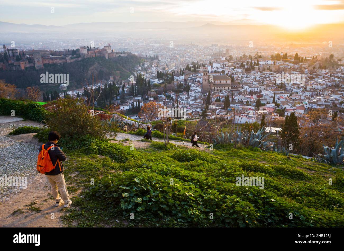 Granada, Andalusia, Spain - January 17th, 2020 : A tourist looks at the ...