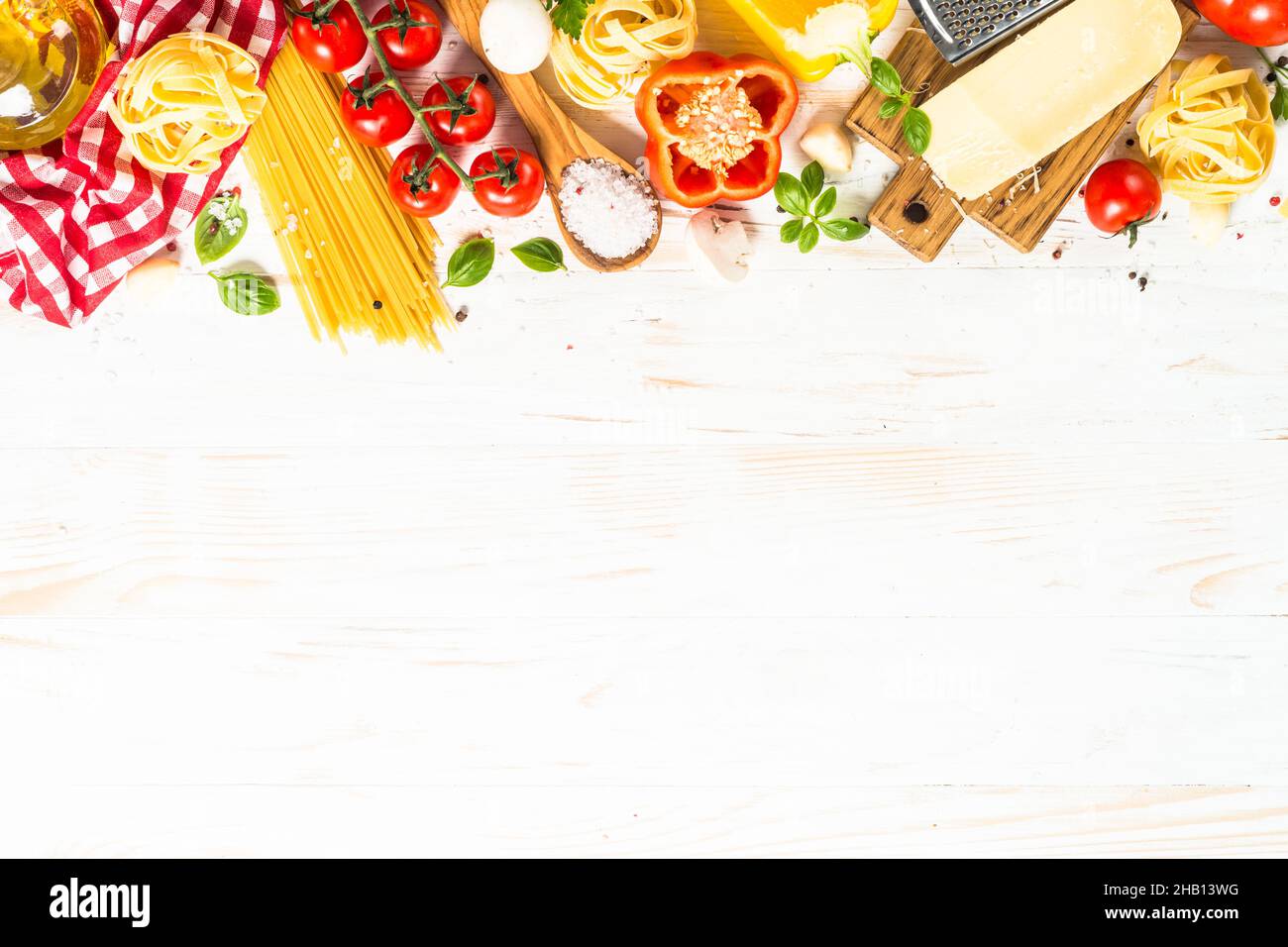 Italian food background at white bkitchen table Stock Photo - Alamy