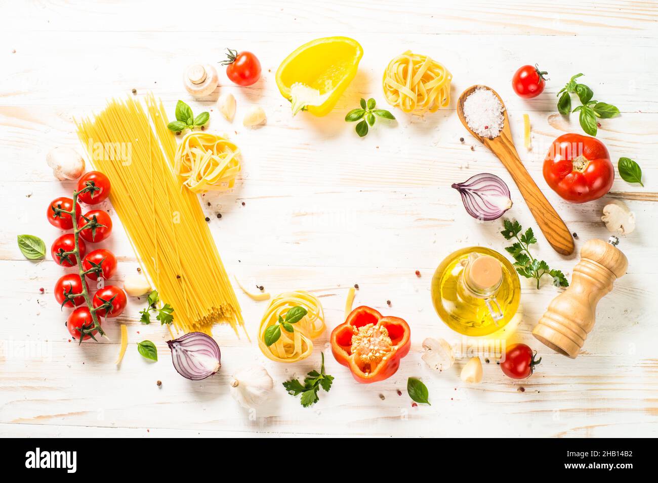 Italian food background at white bkitchen table Stock Photo - Alamy