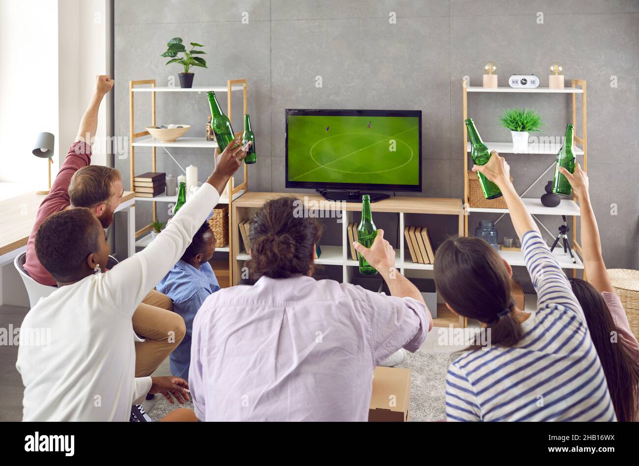 Woman watch soccer game hi-res stock photography and images - Alamy