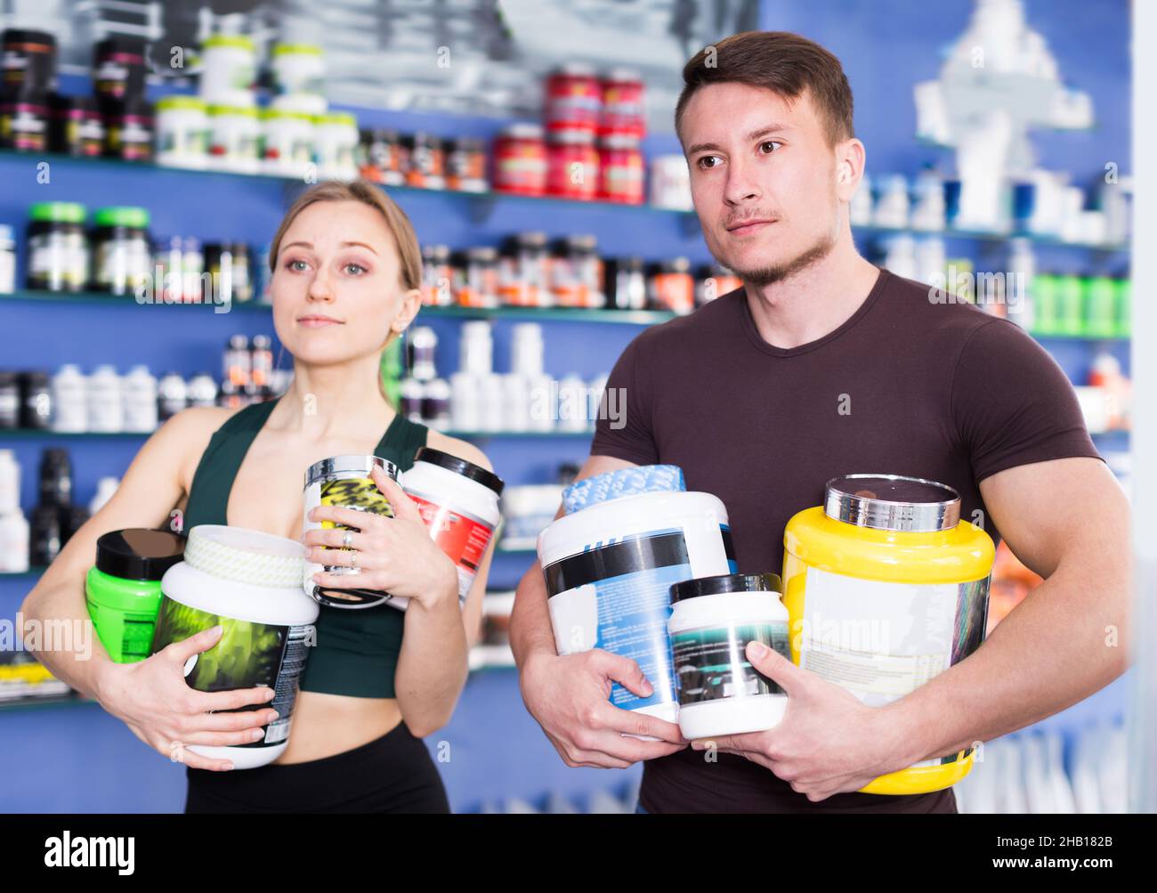 People discussing in shop interior Stock Photo - Alamy