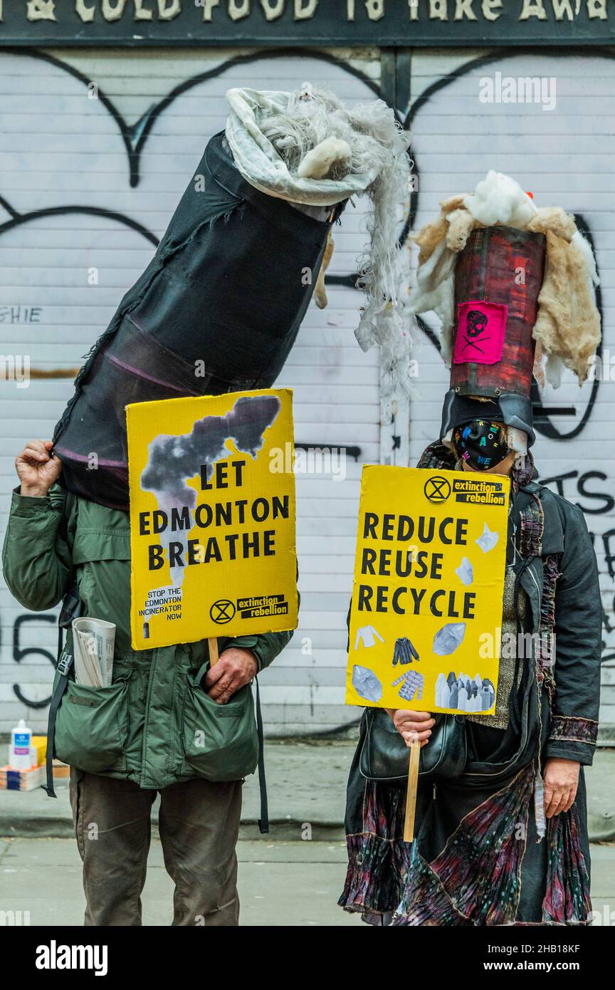 London, UK. 16th Dec, 2021. Tall hats represent the smoking chimneys ...