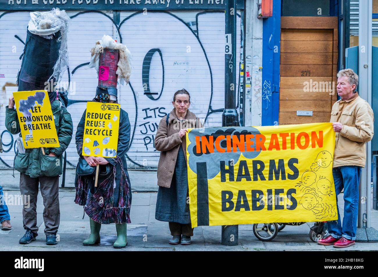 London, UK. 16th Dec, 2021. Tall hats represent the smoking chimneys ...