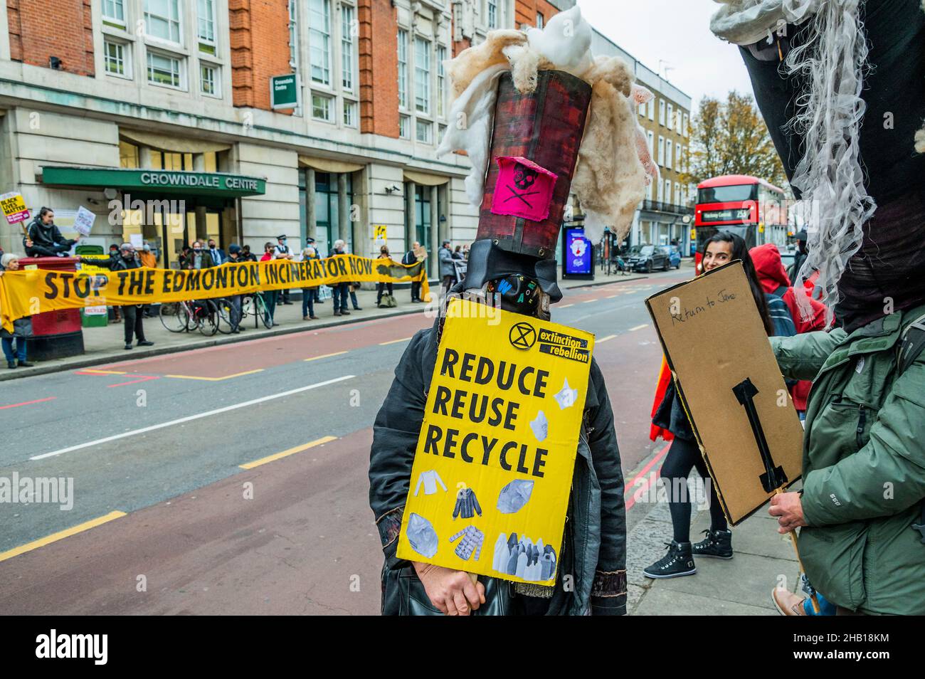 London, UK. 16th Dec, 2021. Tall hats represent the smoking chimneys ...