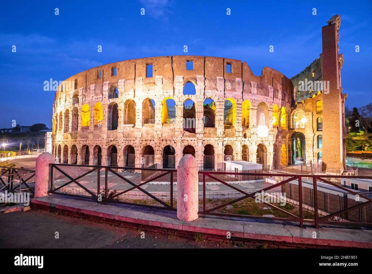Colosseum of Rome empty street at dawn view, most famous landmark of ...