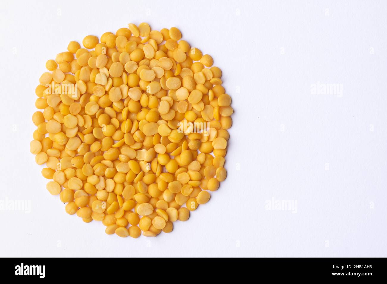 Dry Pigeon Pea pulses split into half and spread in circular shape on ...