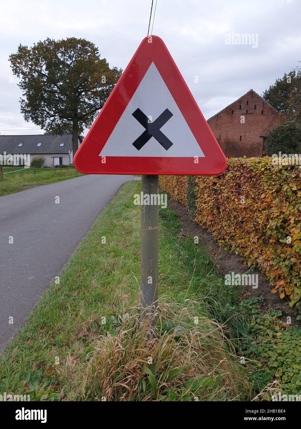 Traffic sign indicating the priority from the right side law for a ...